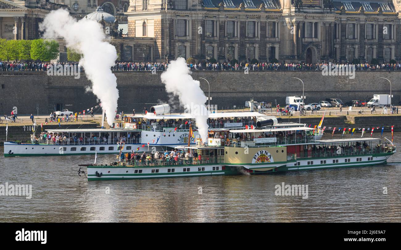 Dresden, Germany. 01st May, 2022. With the signal of their steam sirens ...