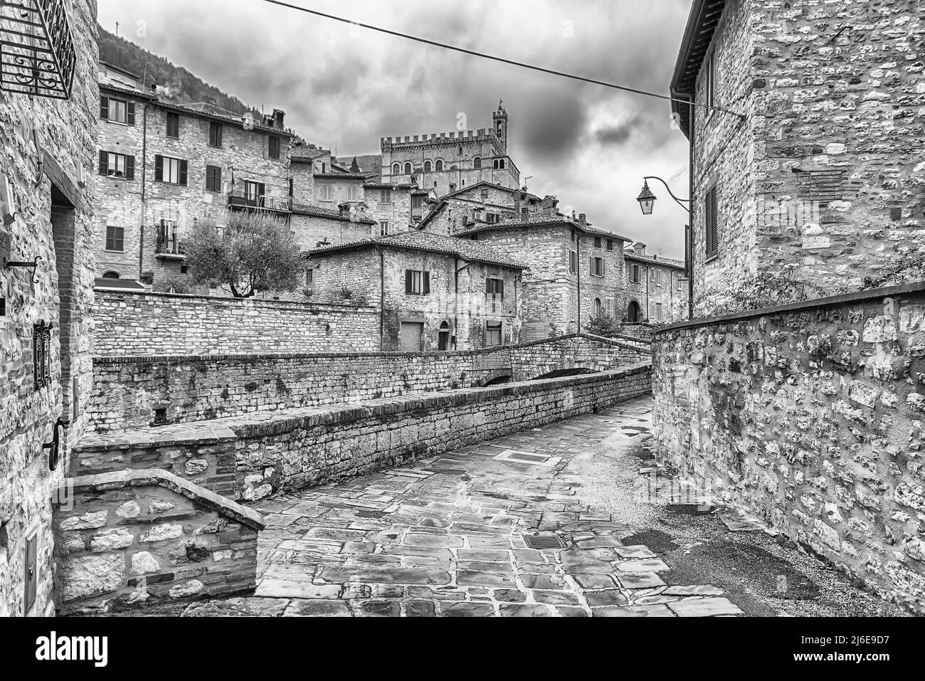 Walking in the picturesque and ancient streets of Gubbio, one of the ...