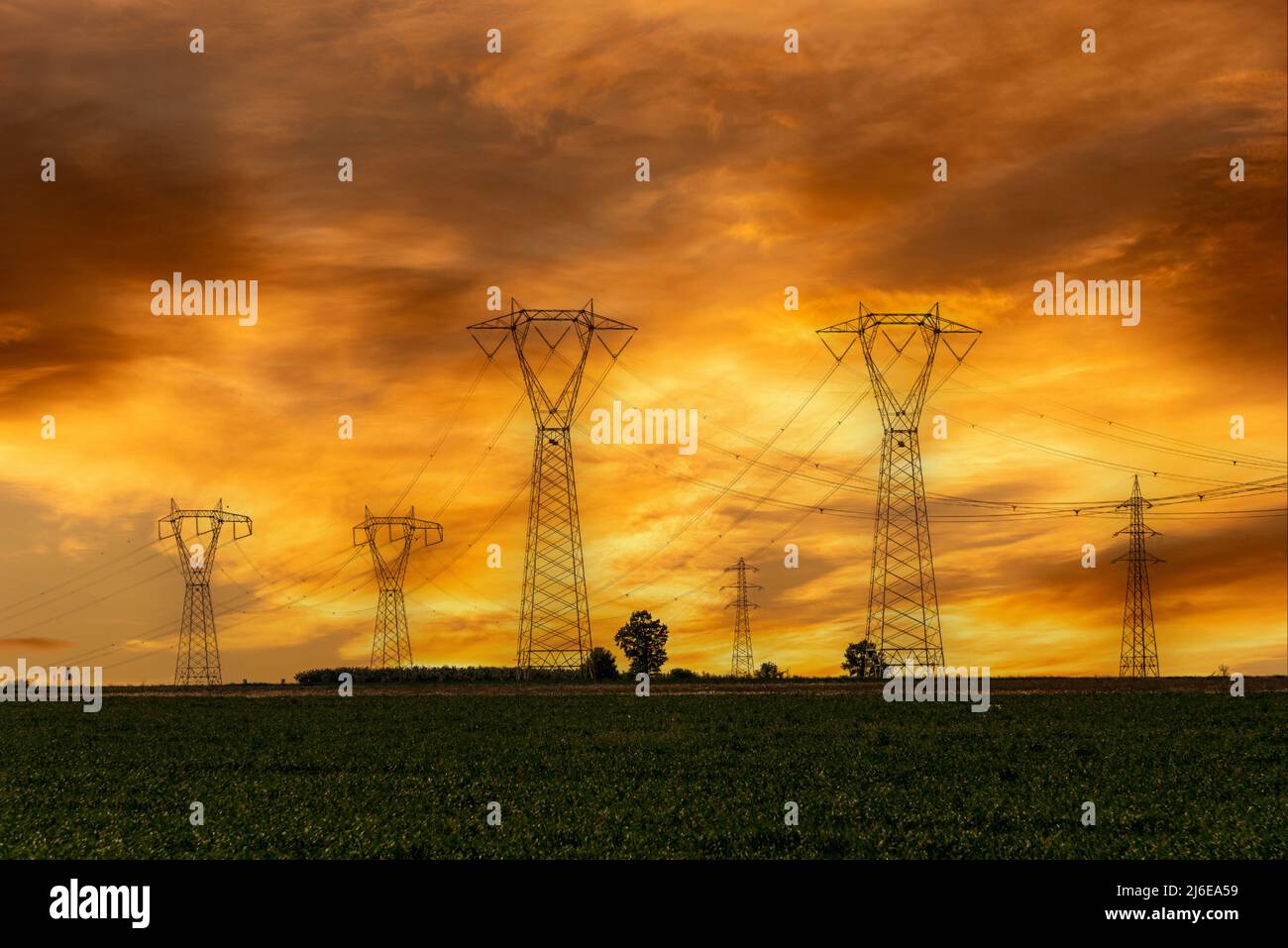 High voltage power lines, high voltage electrical transmission towers ...