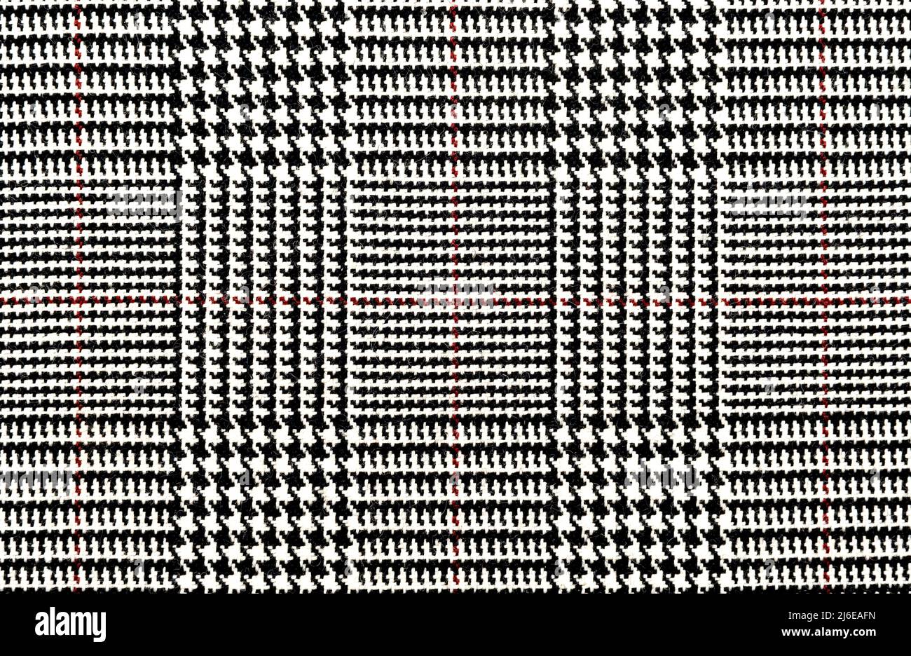 Background from fabric in a cage. A piece of checkered fabric close-up ...