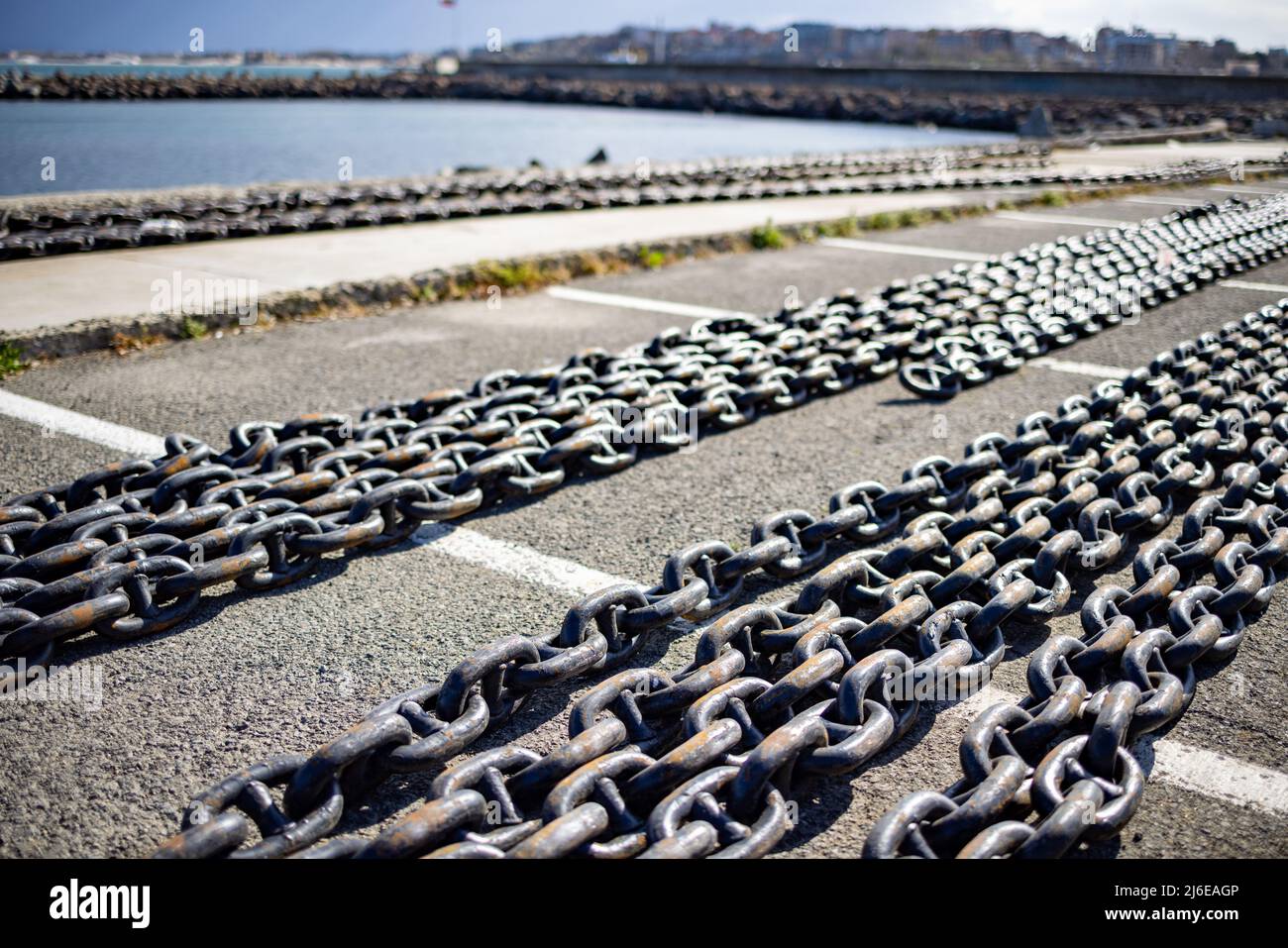 Rusty old anchor and chain on jetty hi-res stock photography and images ...