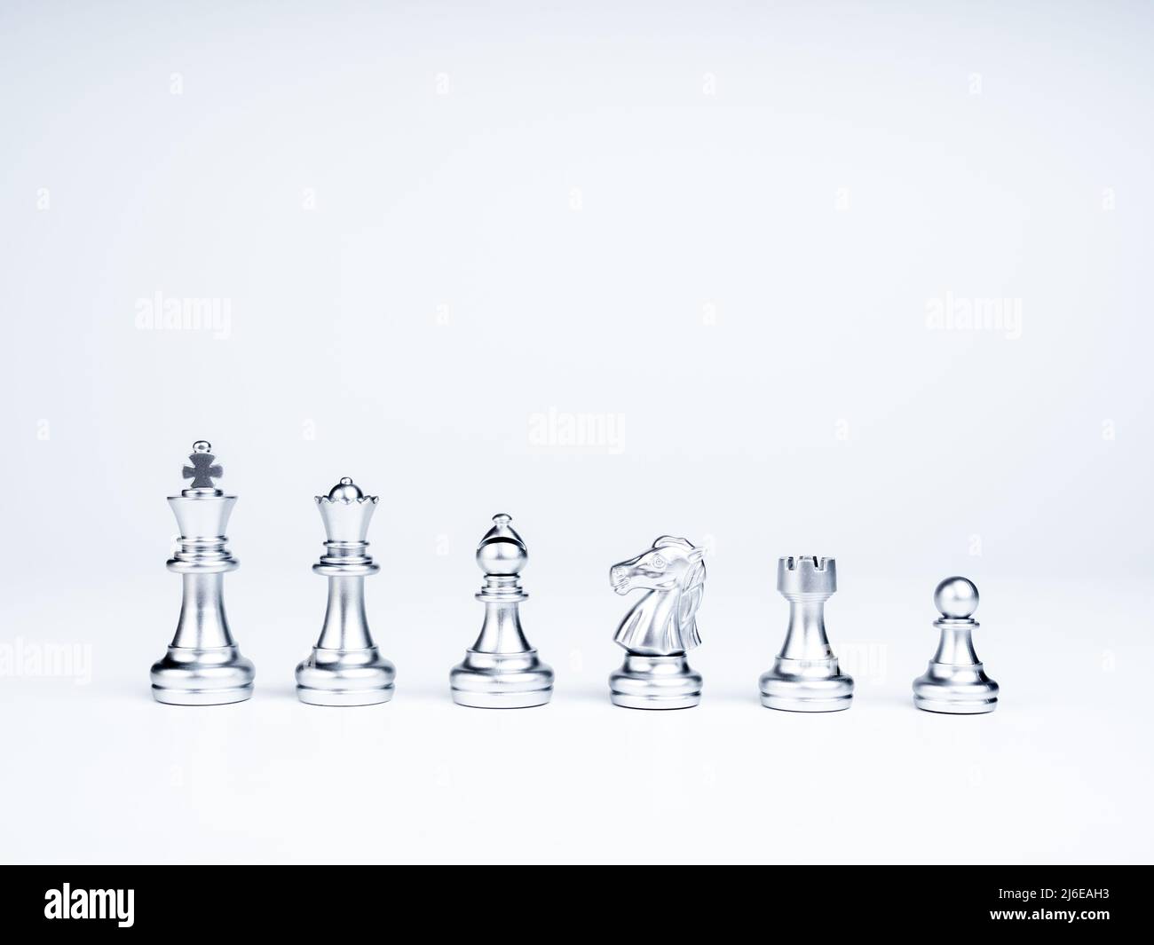 Set of luxury silver chess pieces isolated on white background. The ...