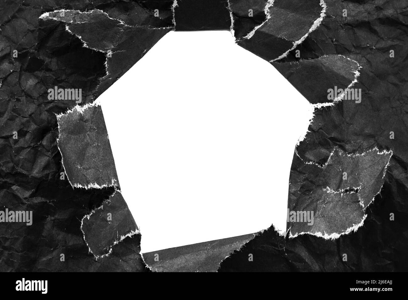 Background of crumpled black paper with a hole and free space for ...