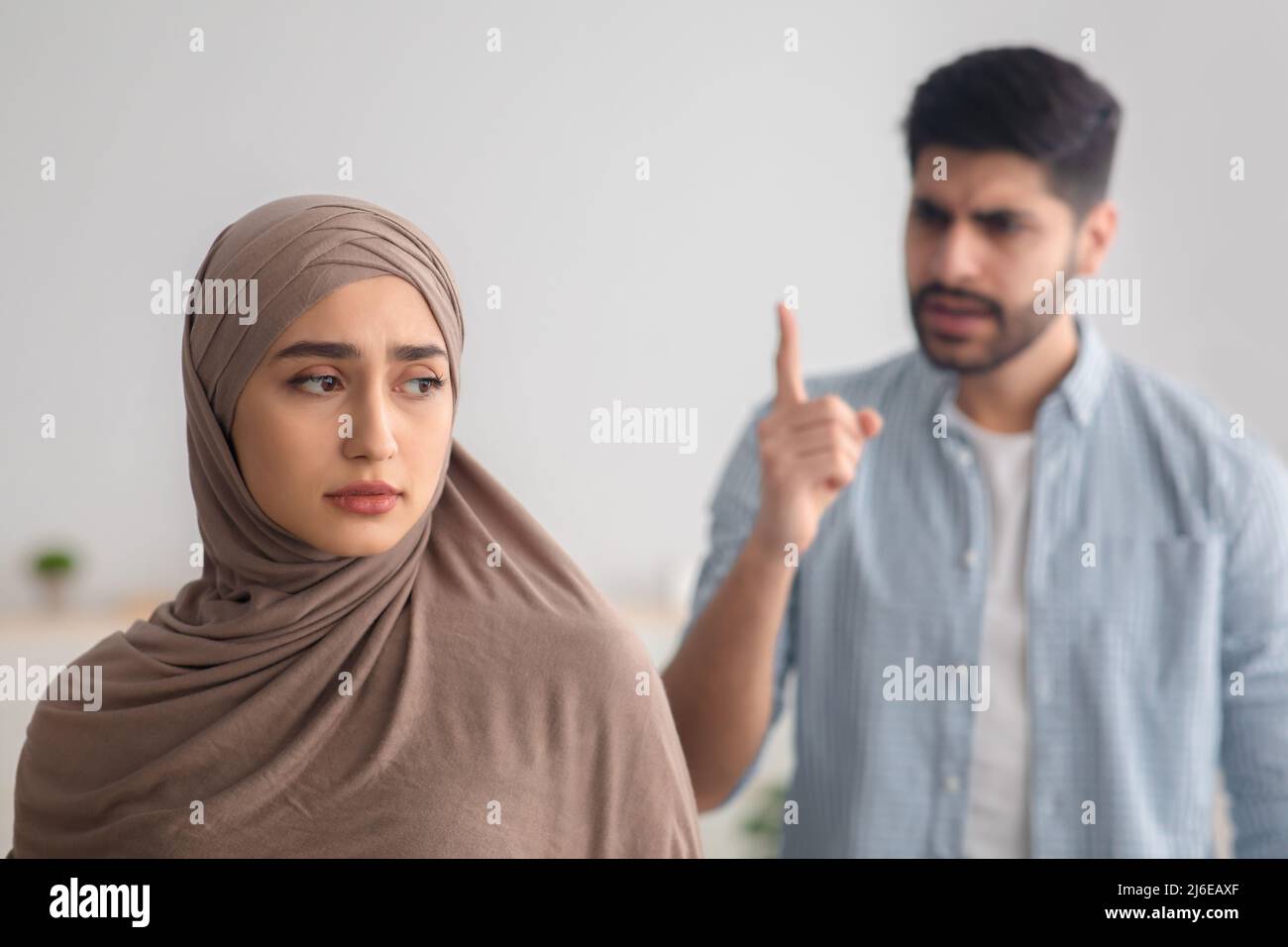 Angry Muslim Man Yelling At Depressed Wife Having Conflict Indoor Stock ...