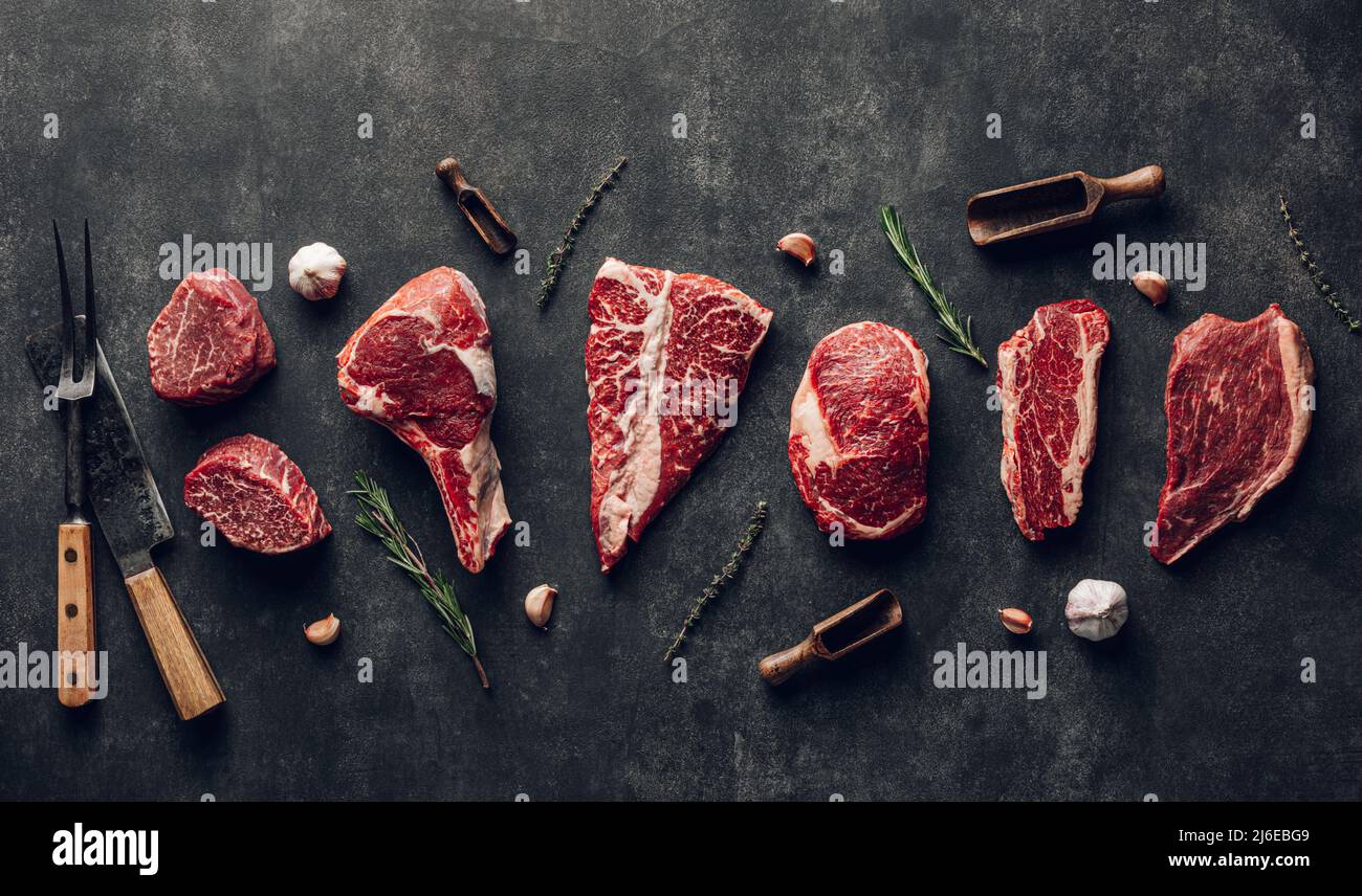 Raw meat types. Rib eye, striploin, tomahawk t-bone, ribeye and ...
