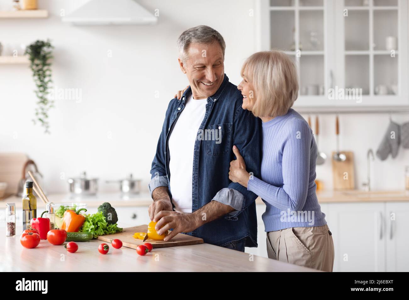 Lady making dinner elderly hi-res stock photography and images - Alamy