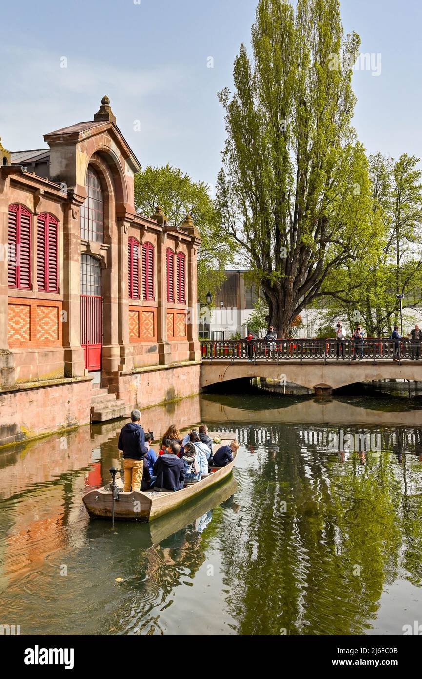 Colmar, France - April 2022: Tourists in a small boat on the canal ...