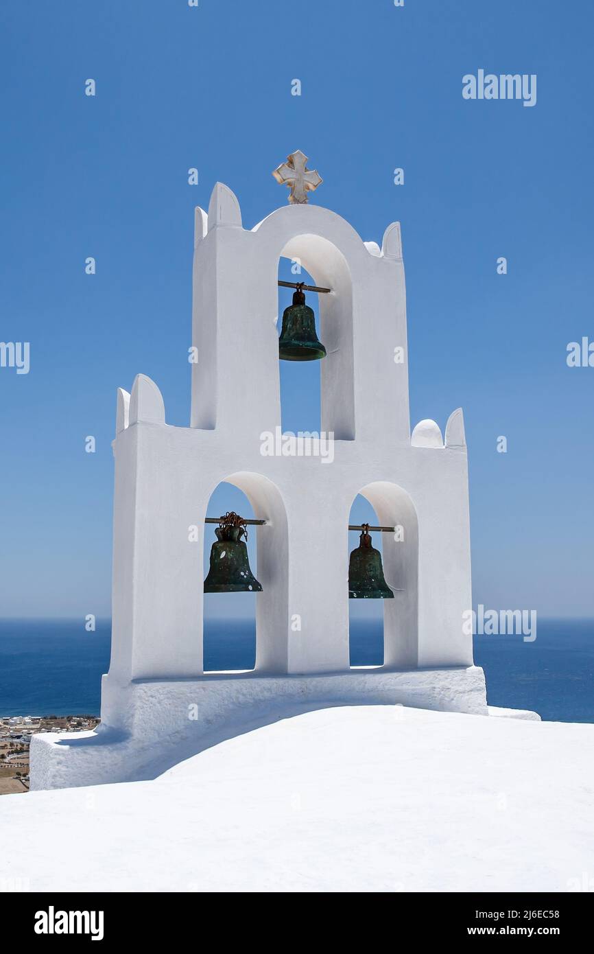 Bell tower of the traditional Greek tower on blue sea background Stock ...