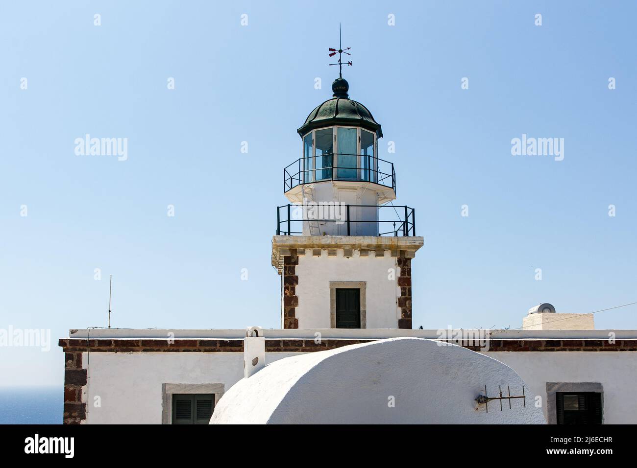 The head of lighthouse on a blue sky background Stock Photo - Alamy