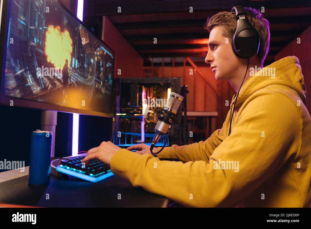 Handsome pro cyber sportsman streaming live video from esport ...