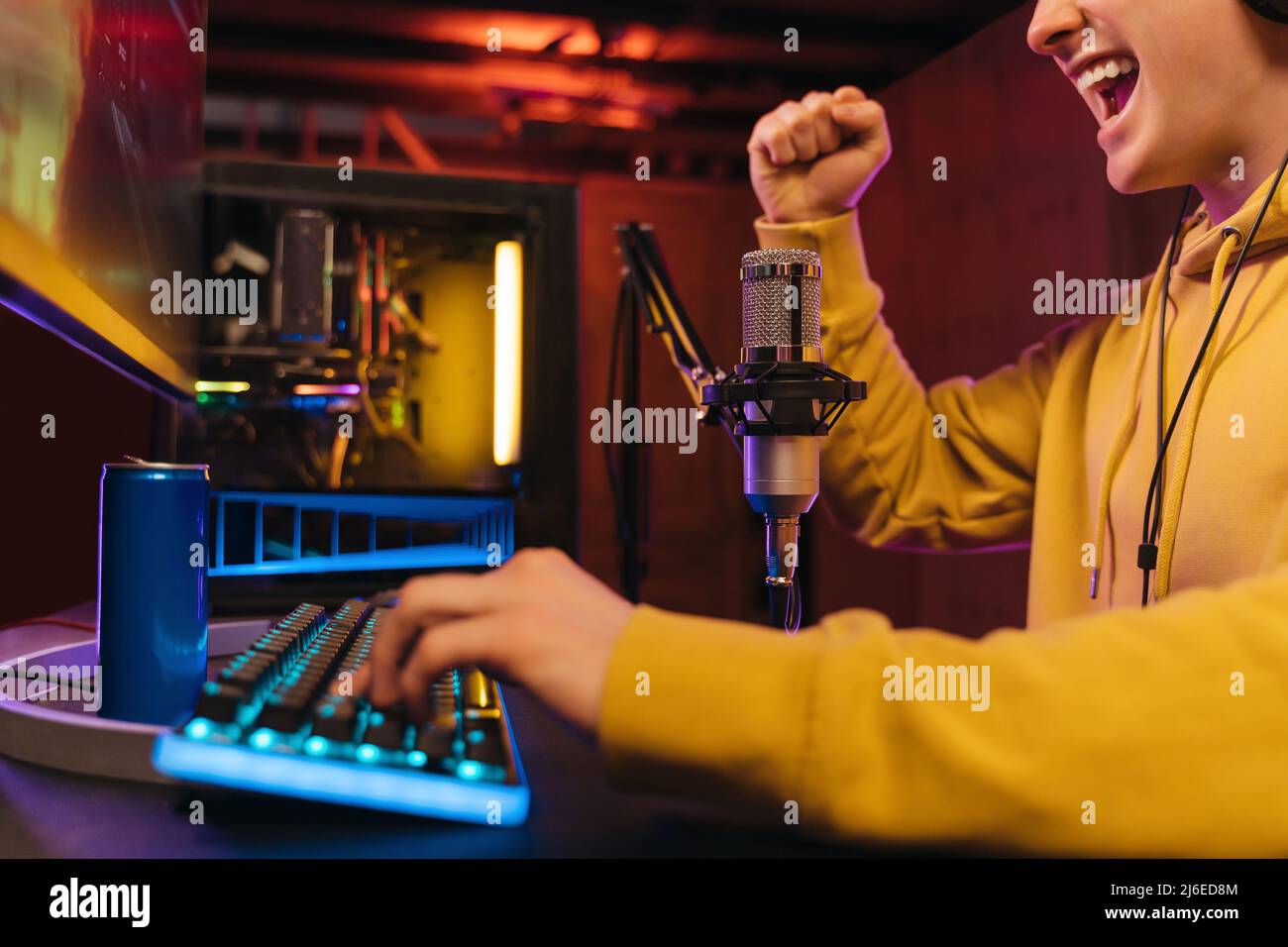 Exited pro gamer influencer and streamer celebrating his victory in ...