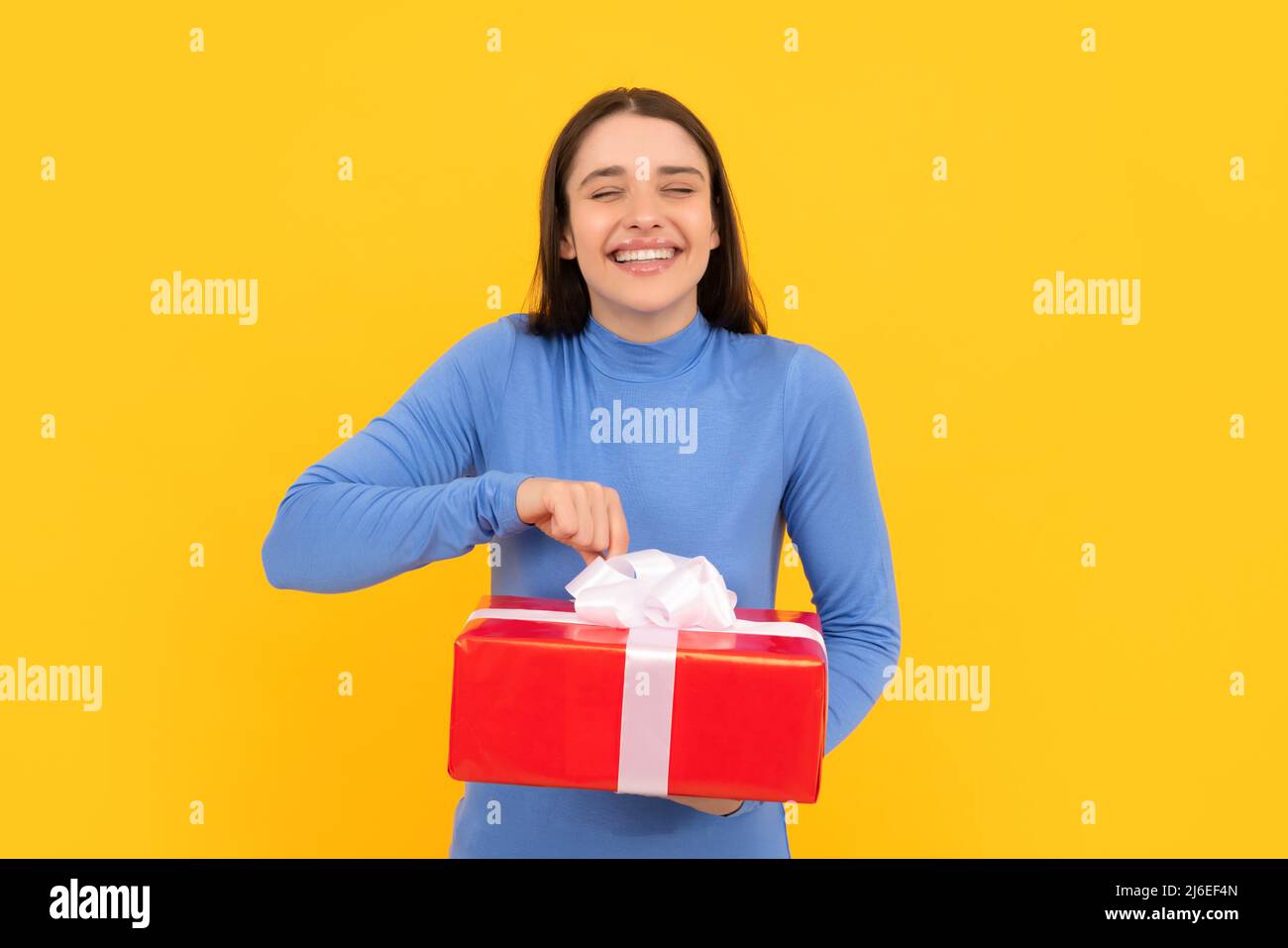 Woman open present hi-res stock photography and images - Alamy