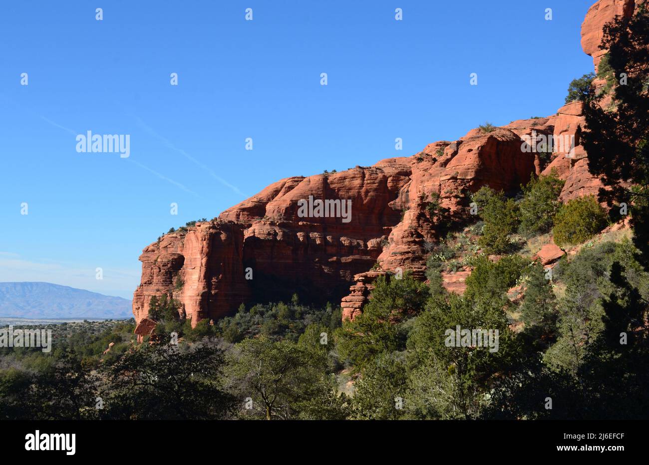 Amazing red rock butte and mesa with blue skies over them Stock Photo ...