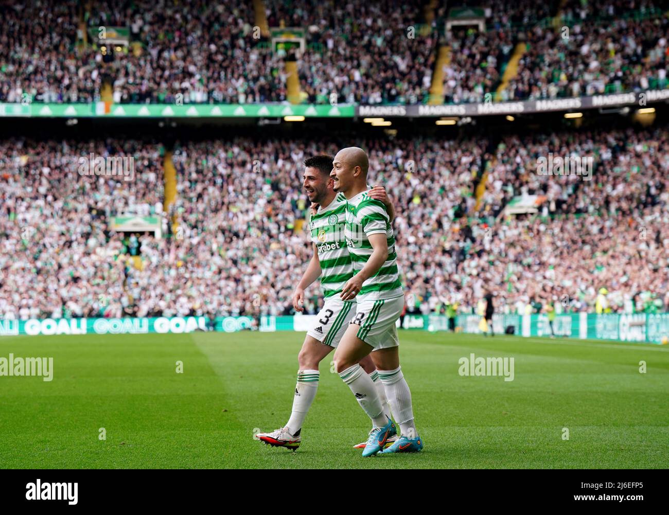 Celtic’s Greg Taylor (left) and Daizen Maeda (right) celebrate the ...