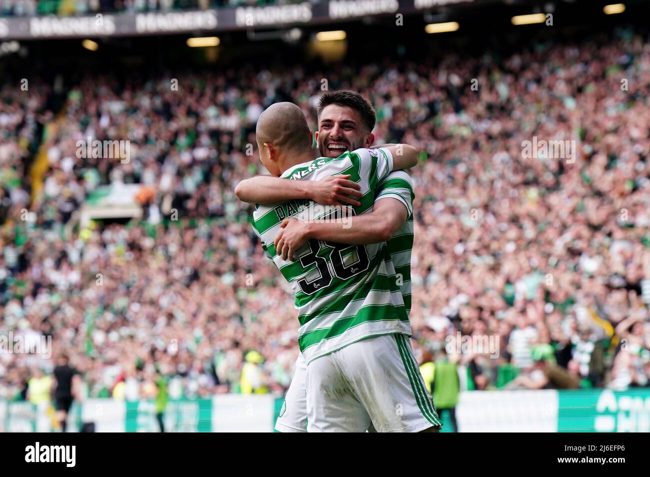 Celtic’s Greg Taylor (right) and Daizen Maeda (left) celebrate the ...