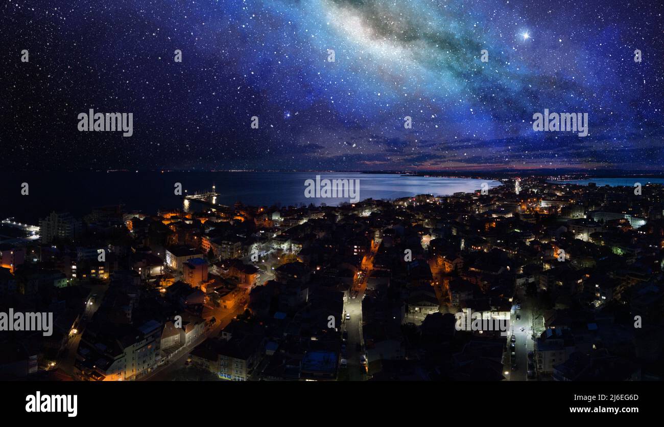 Panorama of night sea luminous city of Pomorie with modern comfortable ...