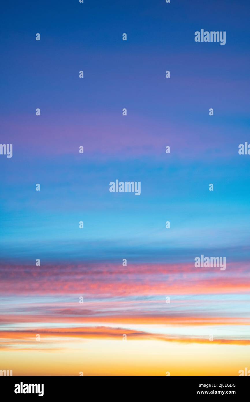 Colourful early morning dawn clouds before sunrise in spring ...