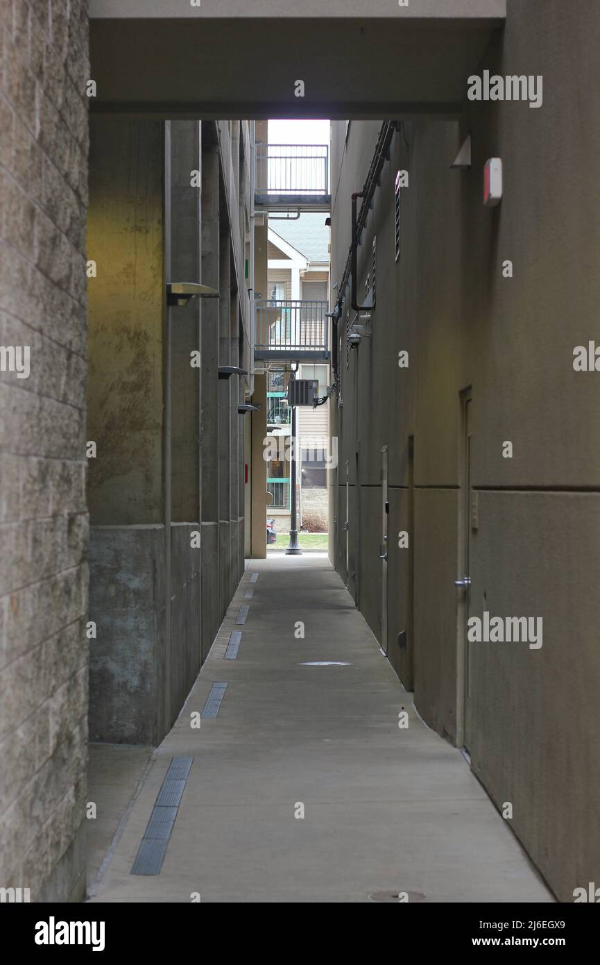 Typical narrow pathway thru two buildings in a small Illinois downtown ...
