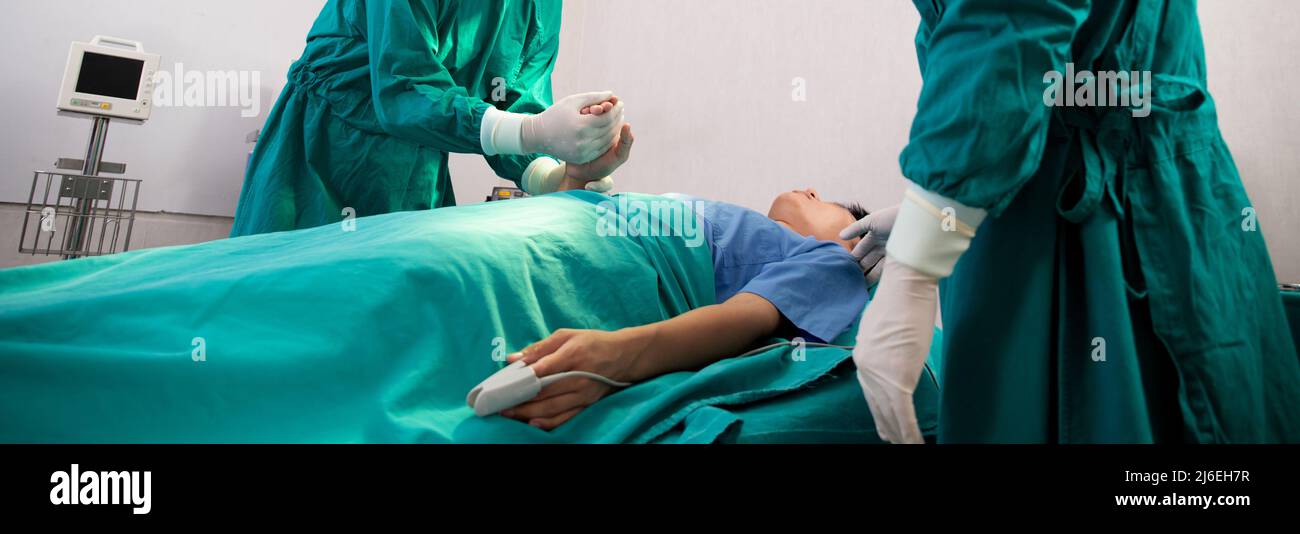 Doctor shake hands with patient for encourage and trust at hospital ...