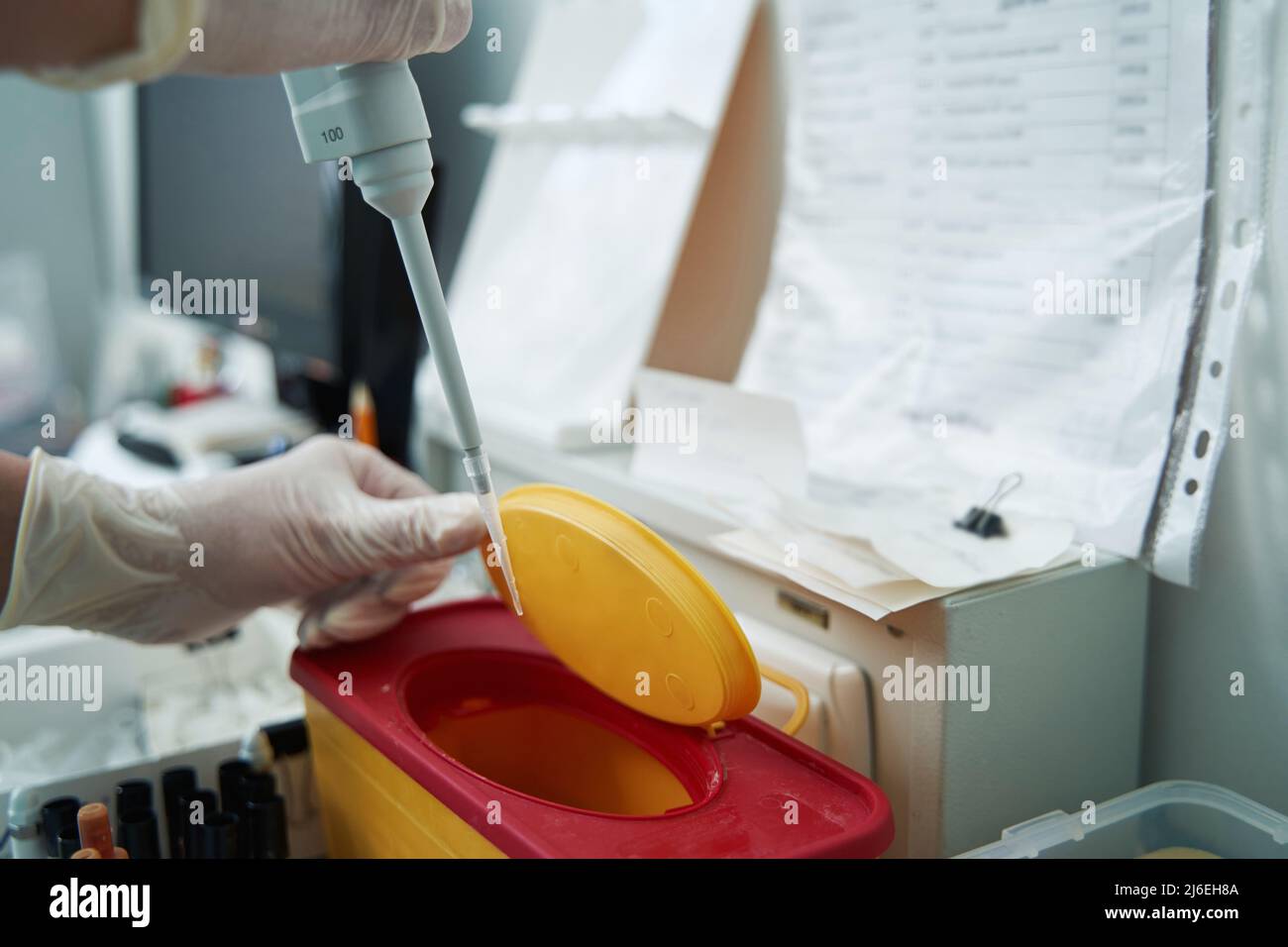 Woman doing PCR tests during working day in clinic Stock Photo - Alamy