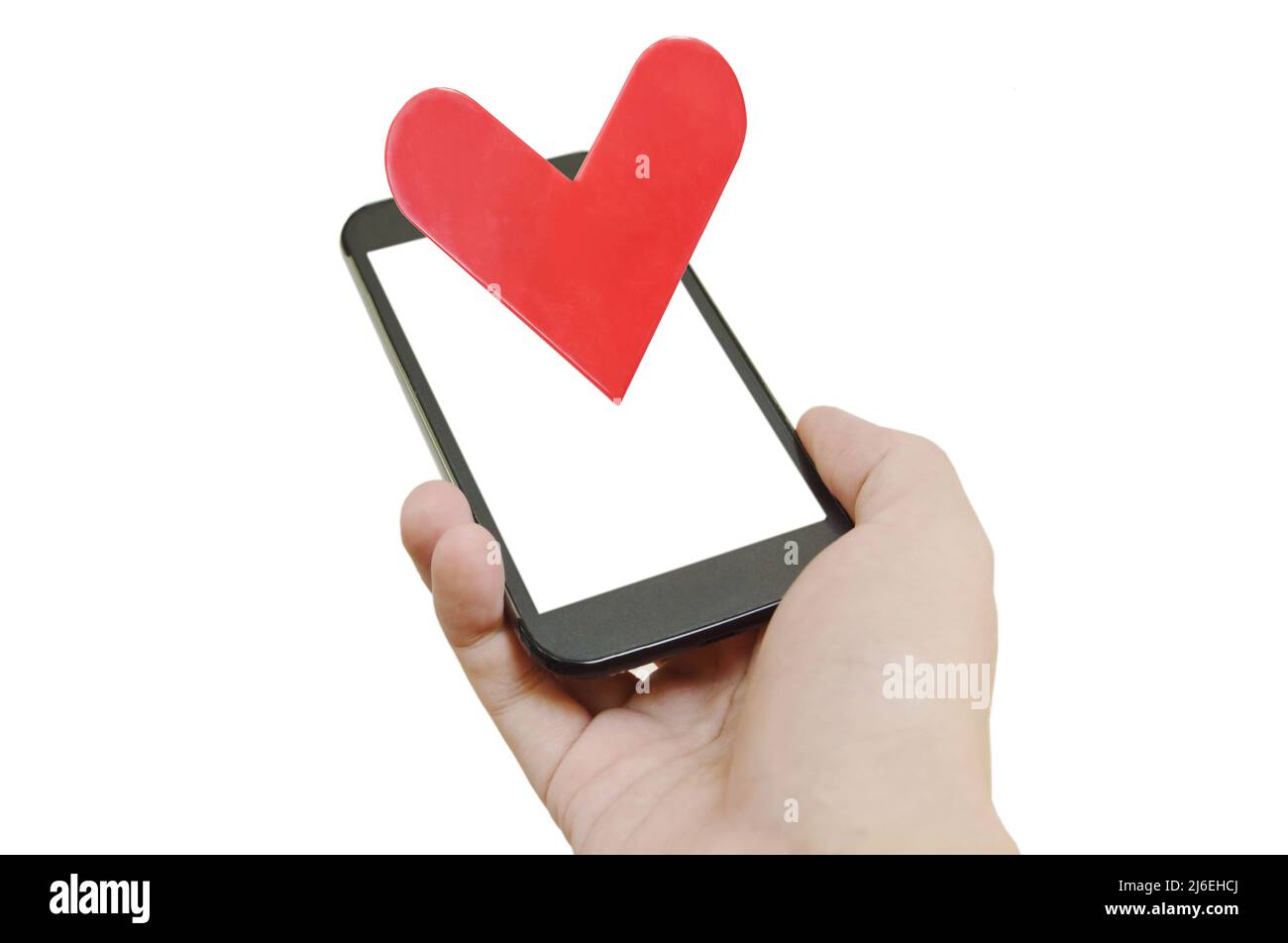 mobile phone holding on man hand sending red heart for lover in white ...