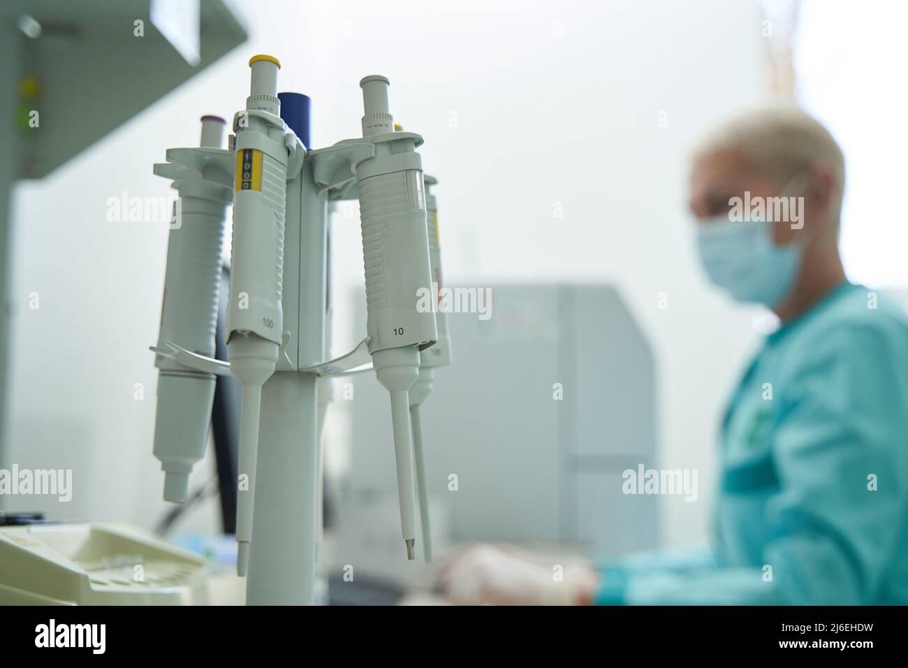 Woman working in laboratory with modern equipment for tests Stock Photo ...