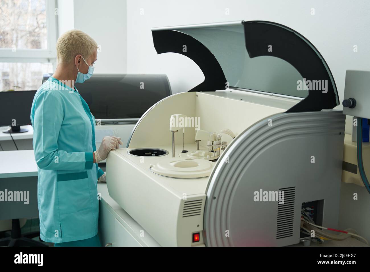 Female working with digital equipment in laboratory Stock Photo - Alamy