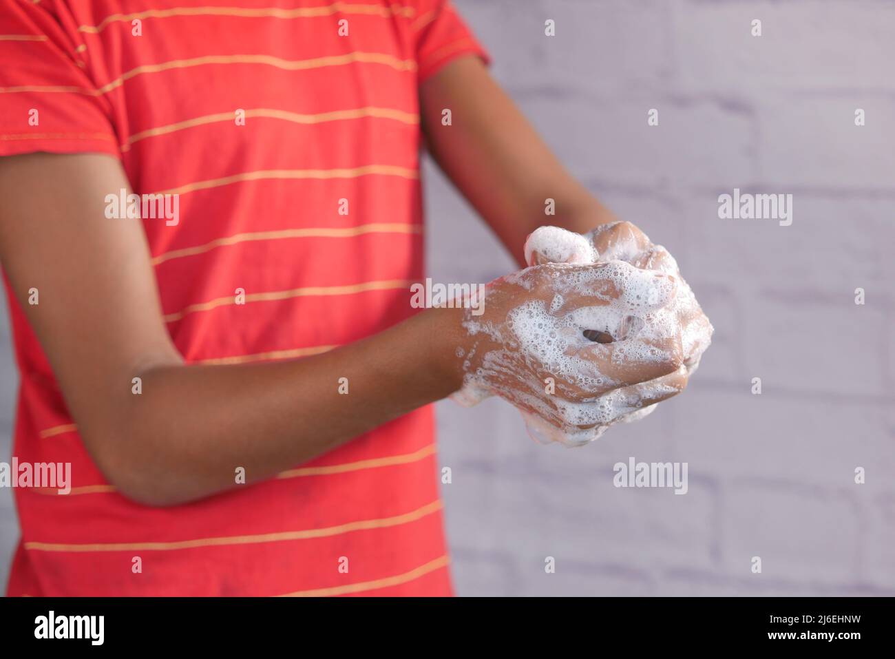 young man washing hands with soap warm water Stock Photo - Alamy