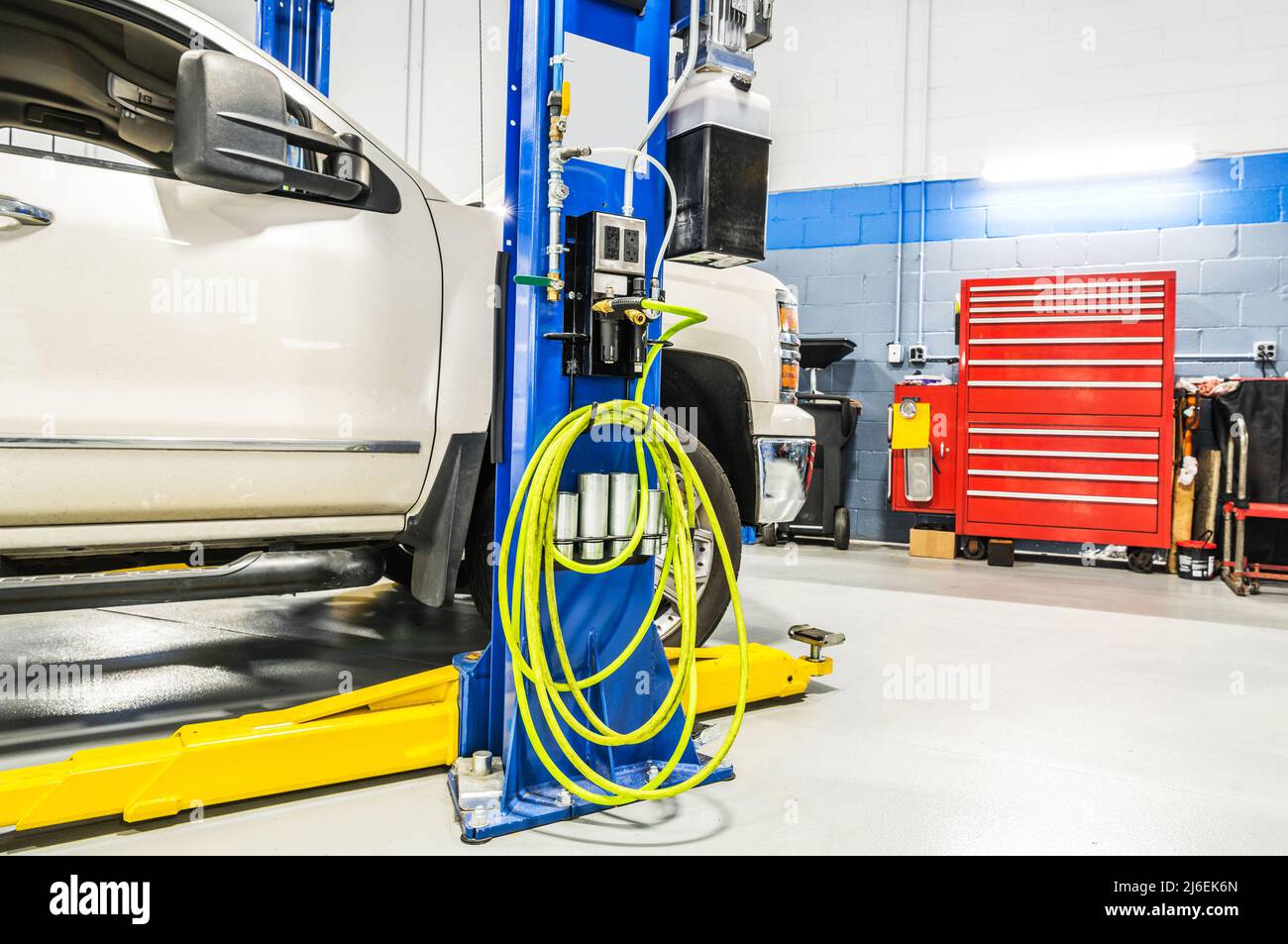 Vehicle Maintenance Service Station with Automotive Lift. Servicing ...