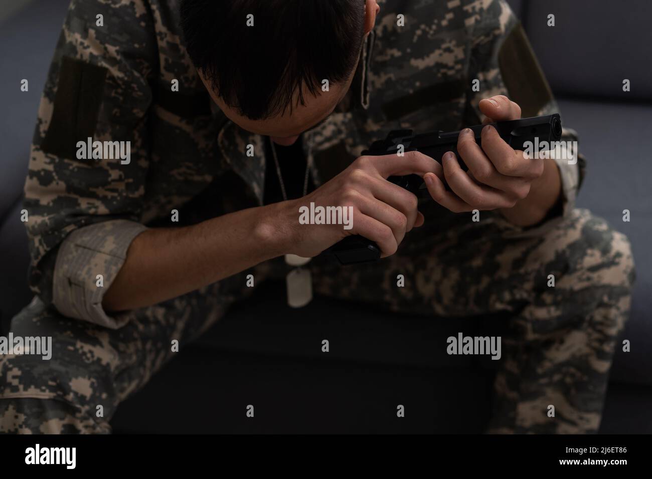 military with sadness and with a gun Stock Photo - Alamy