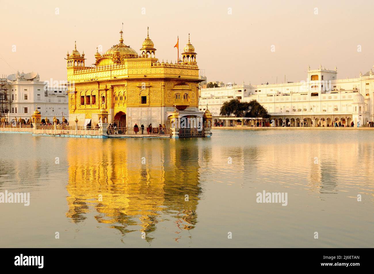 The golden temple of Sikh religion at sunset in Amritsar, Punjab, India ...