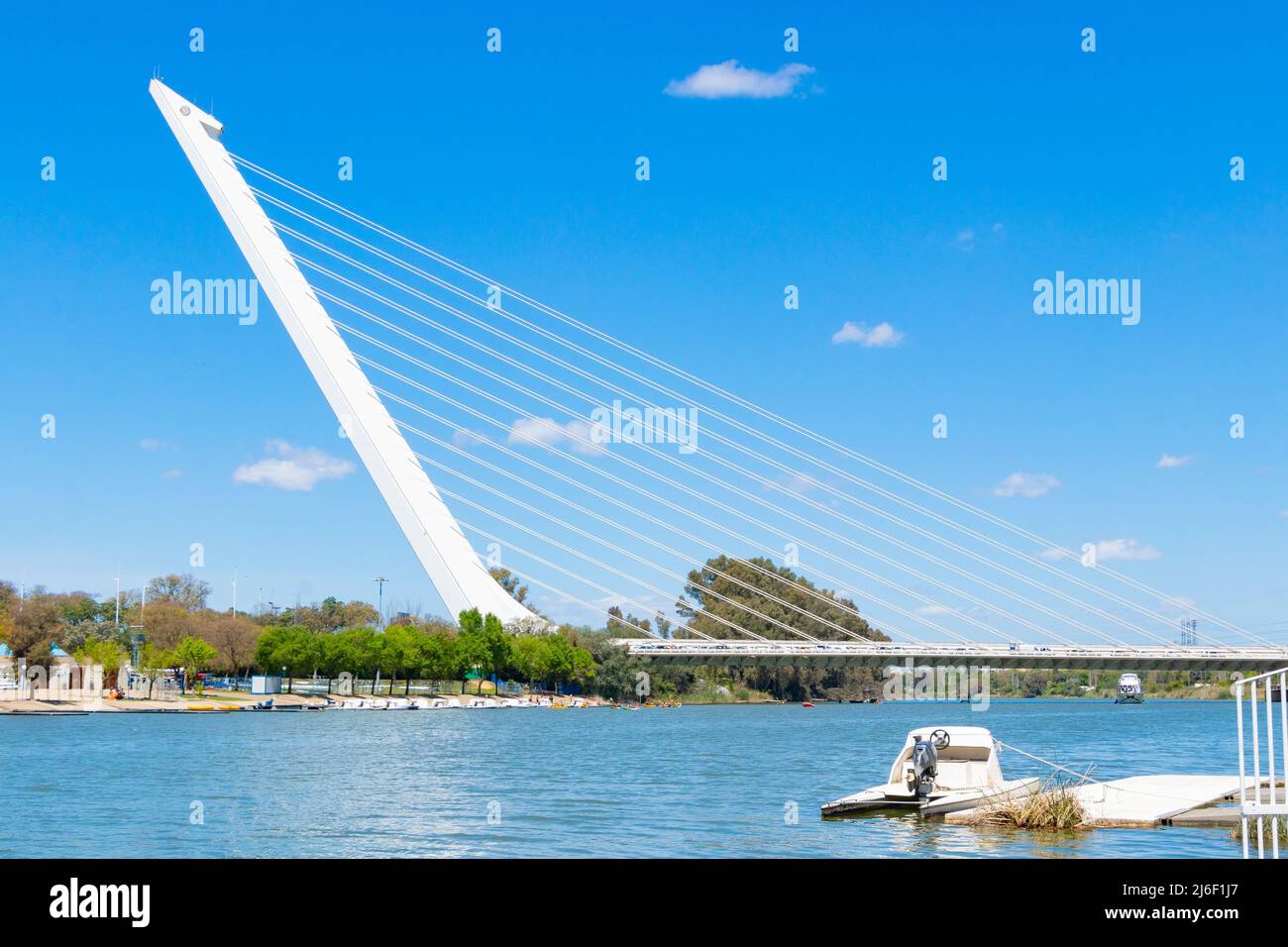 Puente del Alamillo or Alamillo bridge over canal Sevilla-Bonanza in ...