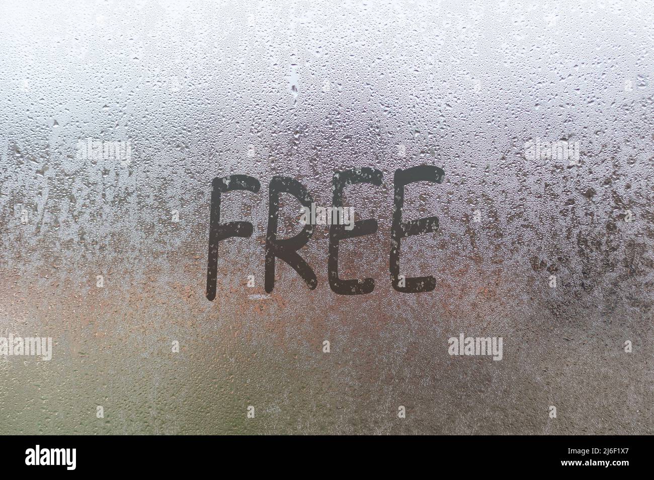Foggy glass on window with written finger word free Stock Photo - Alamy