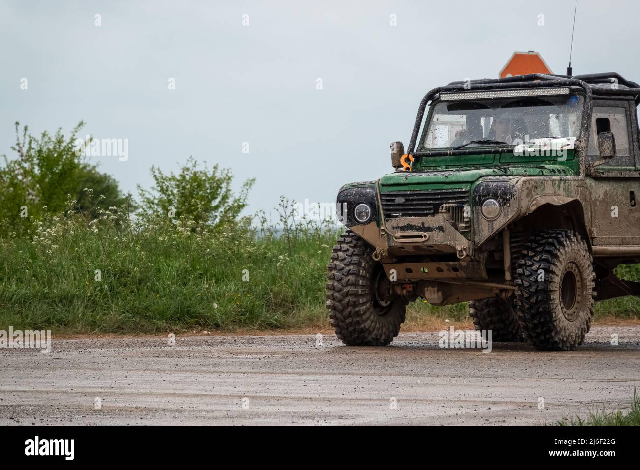 adapted Land Rover Defender SWB on a stone track to head off-roading ...