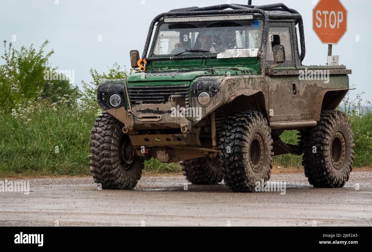adapted Land Rover Defender SWB on a stone track to head off-roading ...