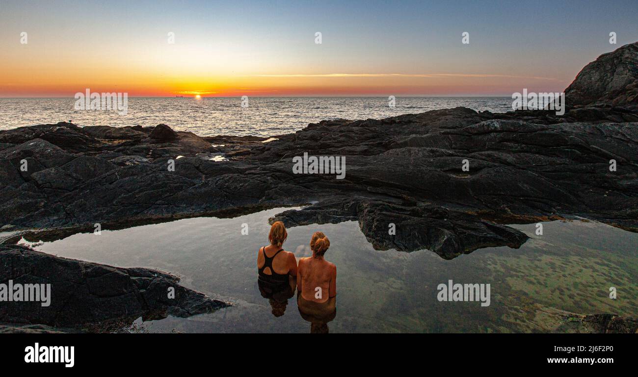 Women bathing in tide pool hi-res stock photography and images - Alamy