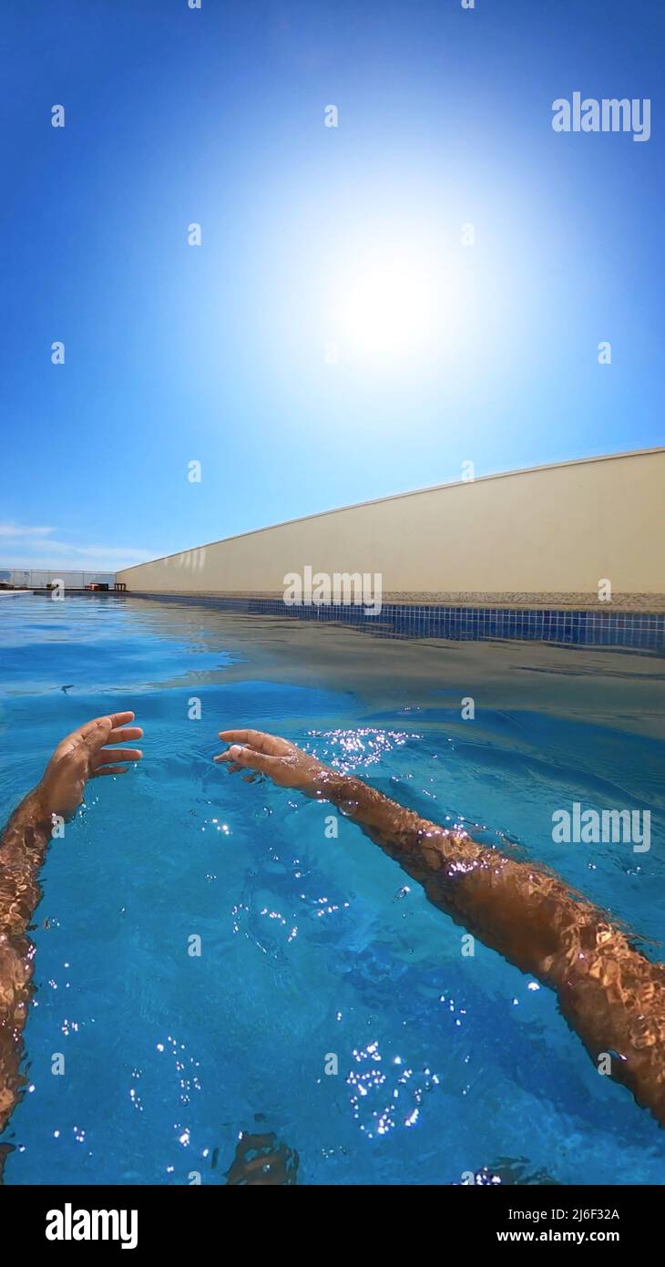 Summer Time - First view of a black man having fun in the pool Stock ...