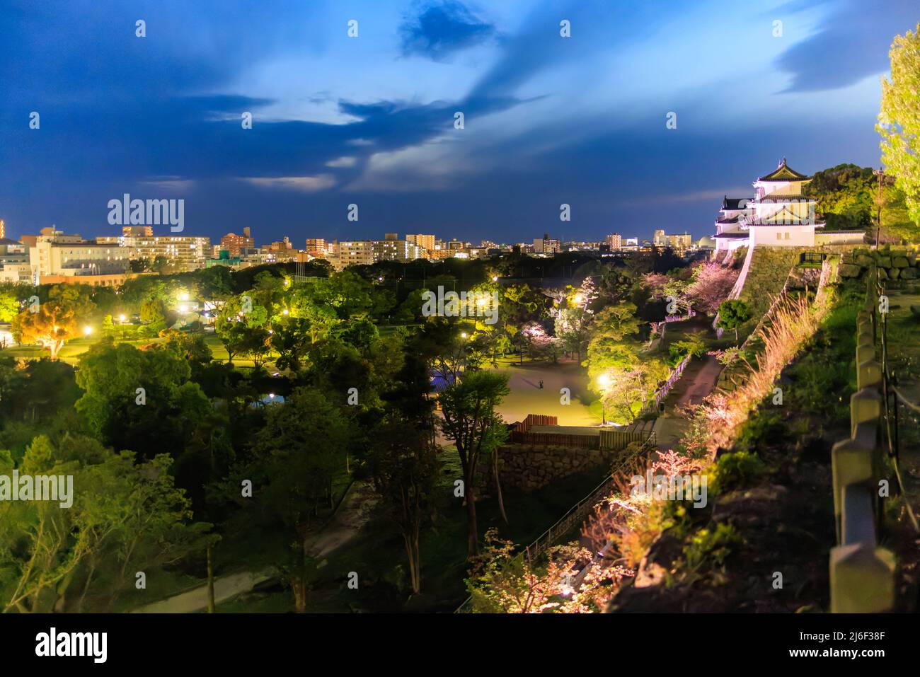 Historic castle lookout over park and sprawling city at night Stock ...