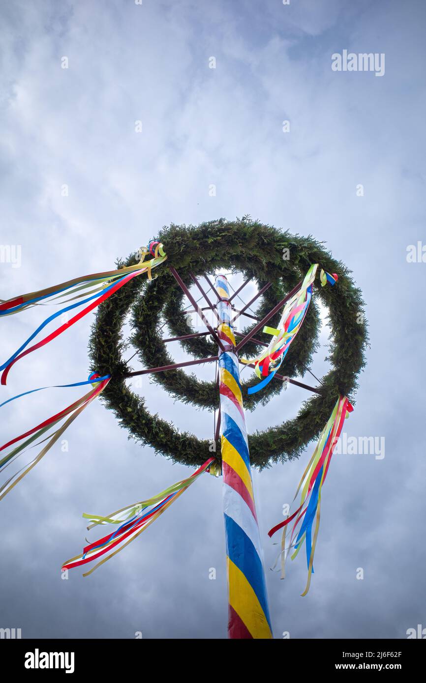 a maypole decorated with colorful ribbons Stock Photo - Alamy