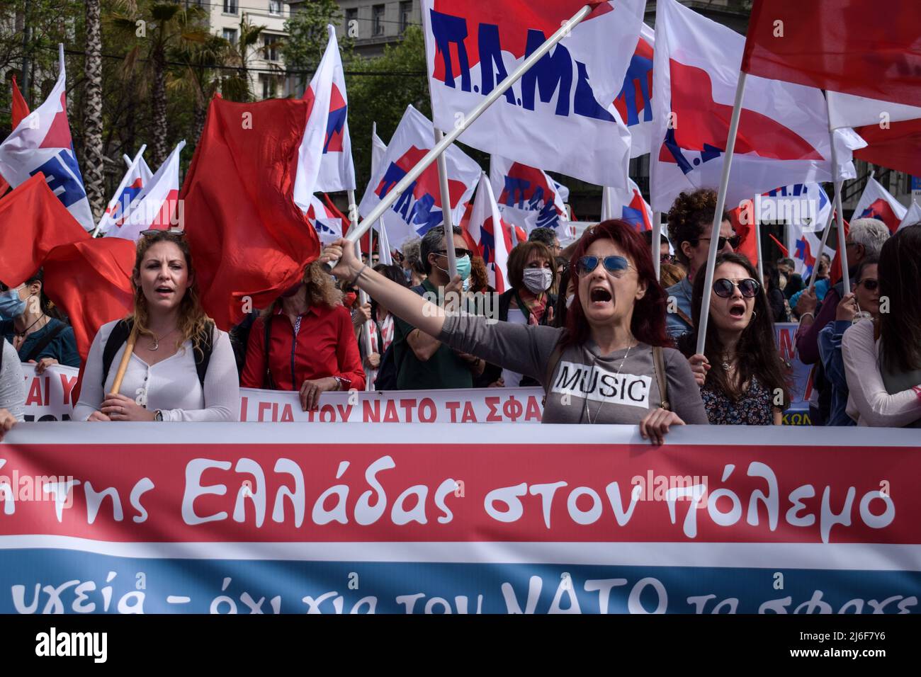 Athens, Greece, 1 May 2022. Women shout slogans while waving flags ...