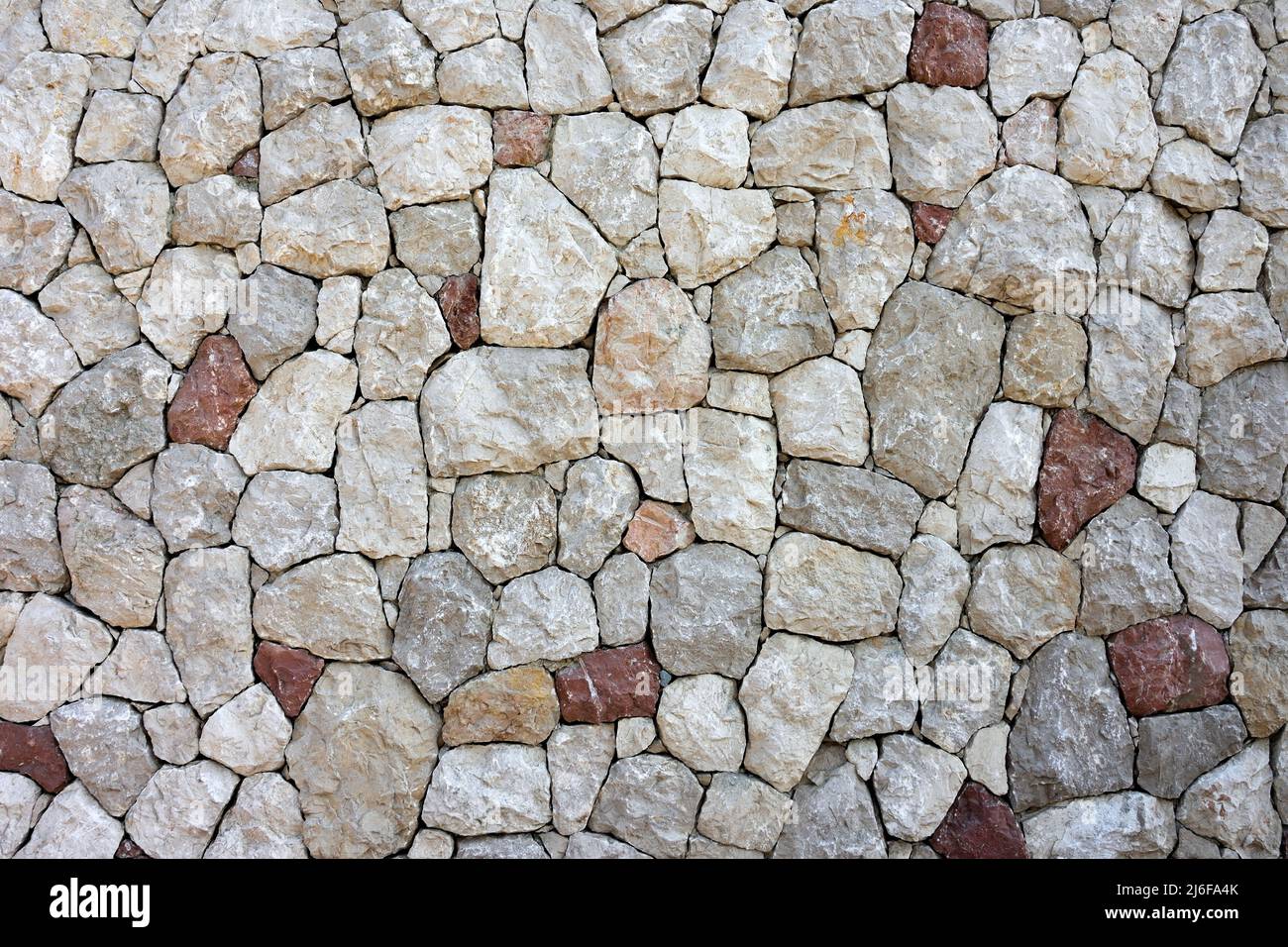Stone wall as a background Stock Photo - Alamy