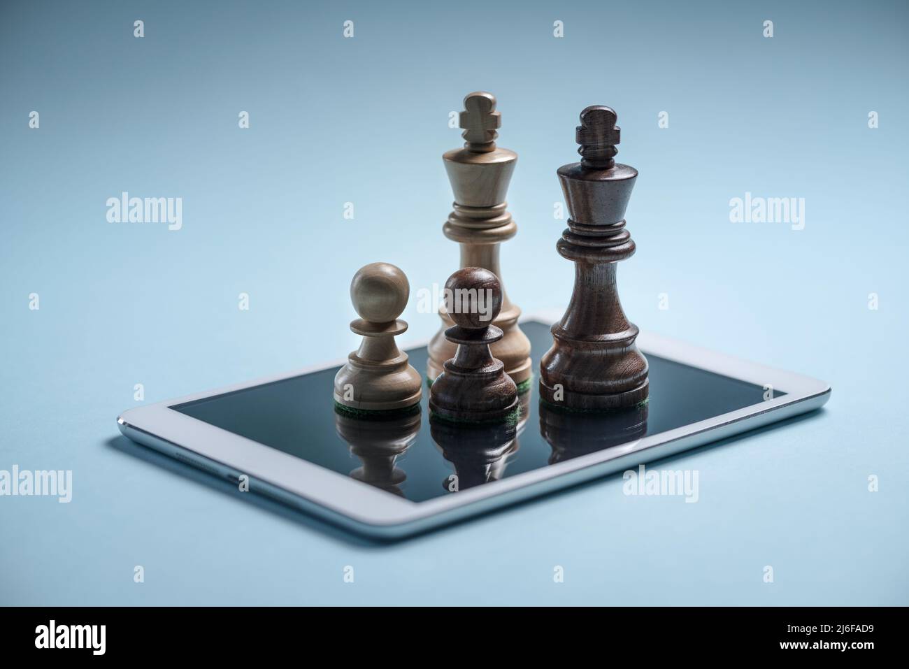 Chess pieces on a digital tablet: online chess video game concept Stock ...