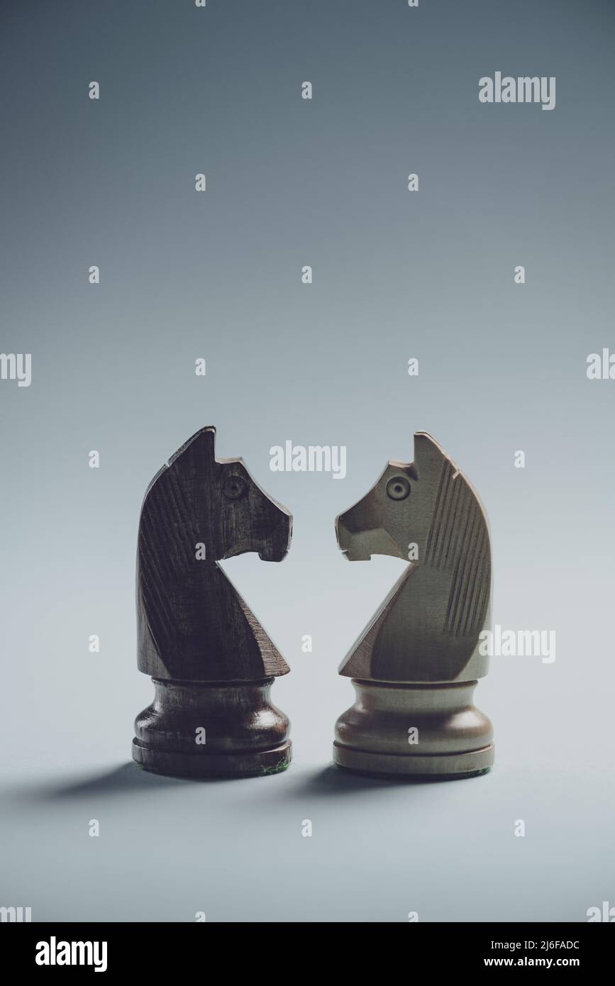 Knights opposing each other: chess game and competition concept Stock ...