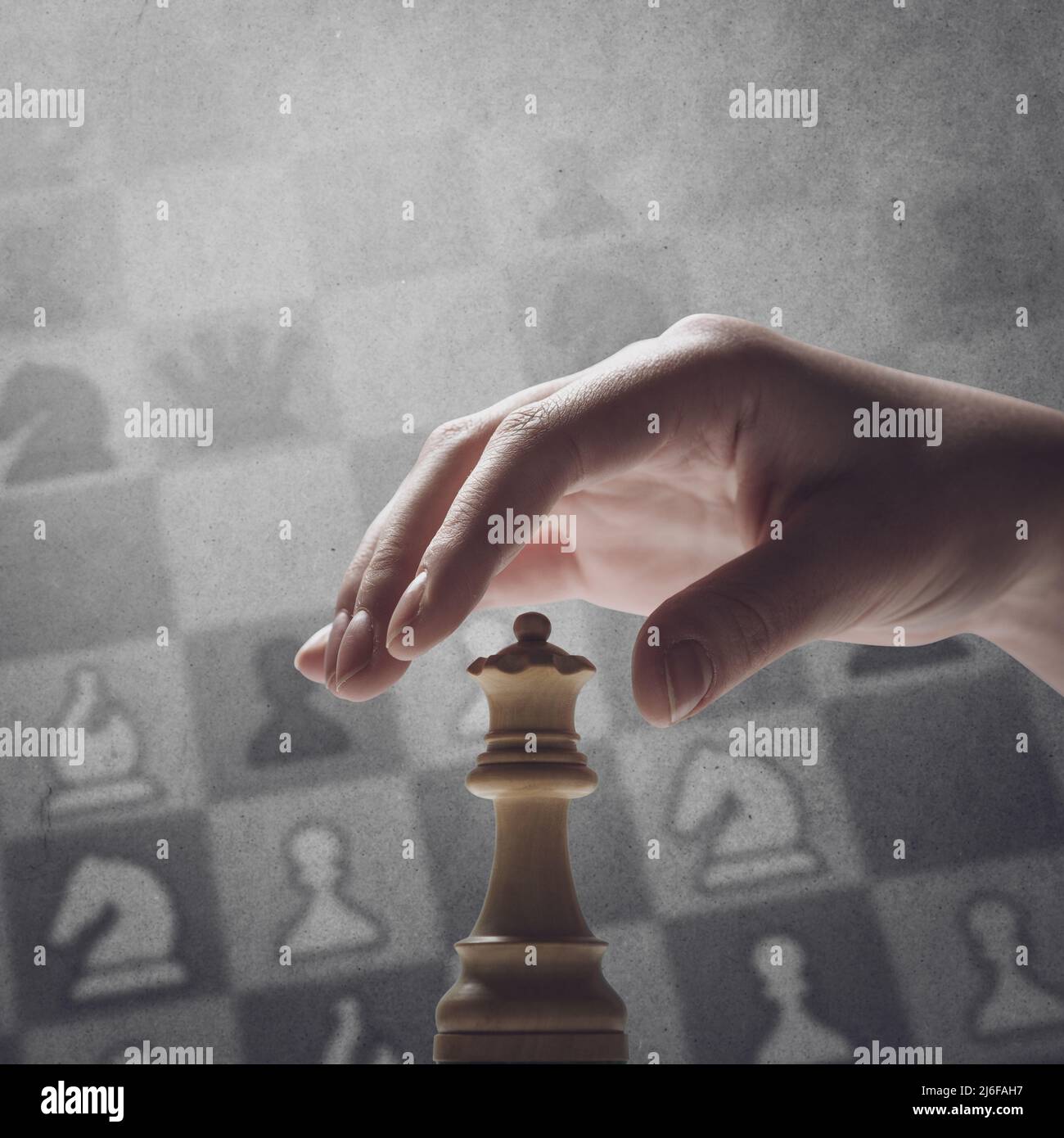 Professional player moving the queen and chess diagram in the ...