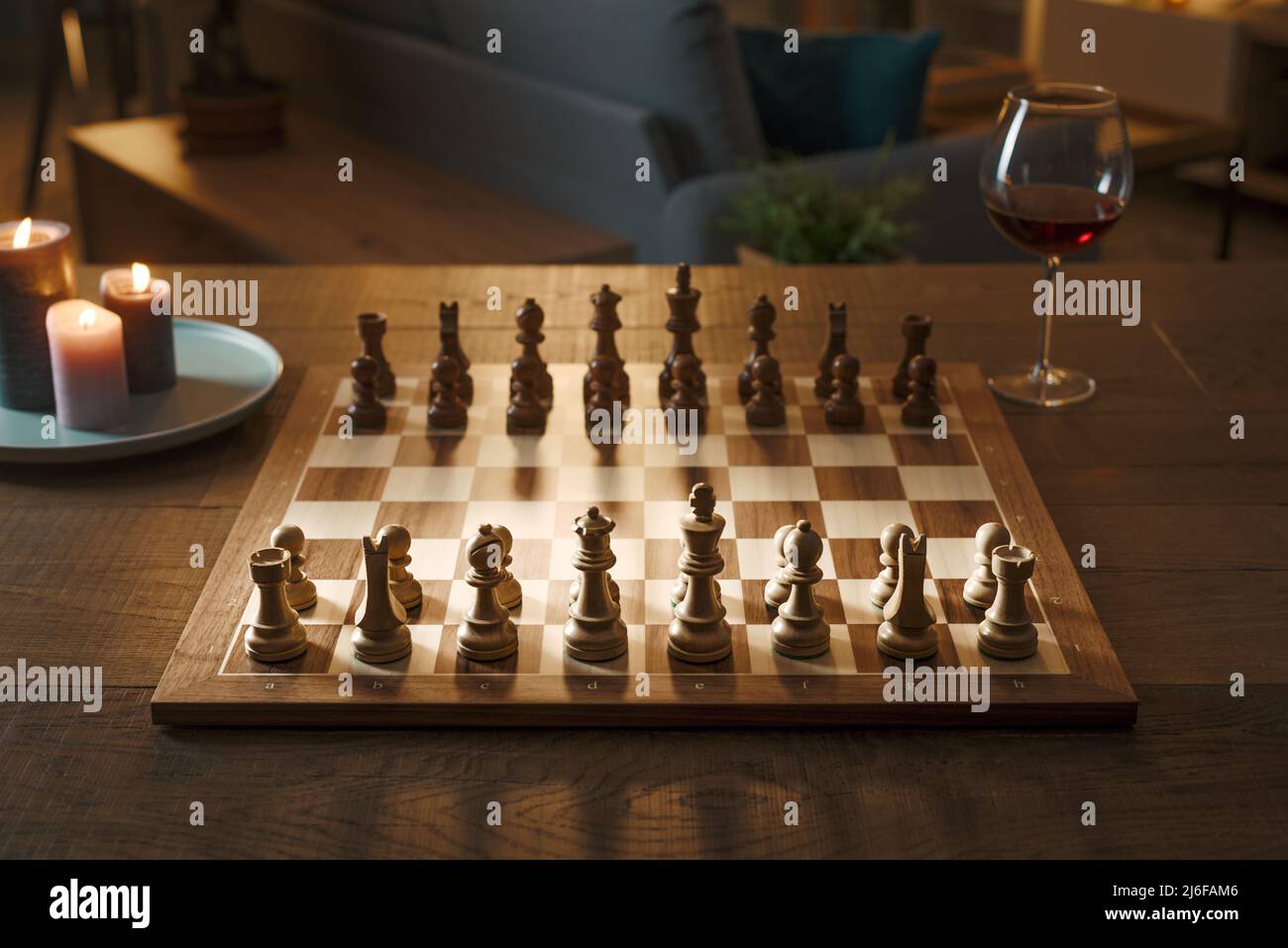 Chess pieces arranged on the chessboard in the living room, board games ...