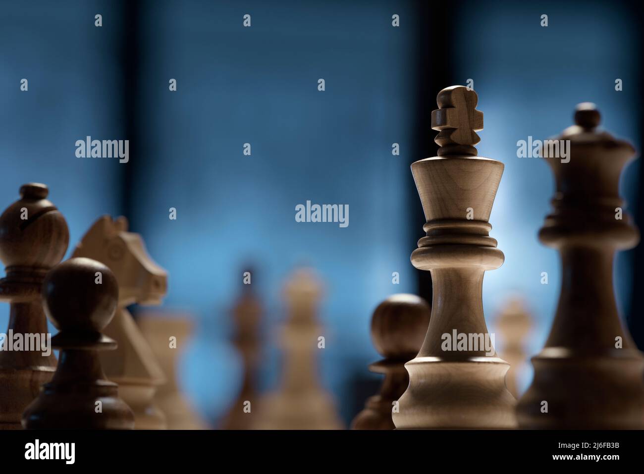 Chess pieces on the chessboard close up, chess game concept Stock Photo ...
