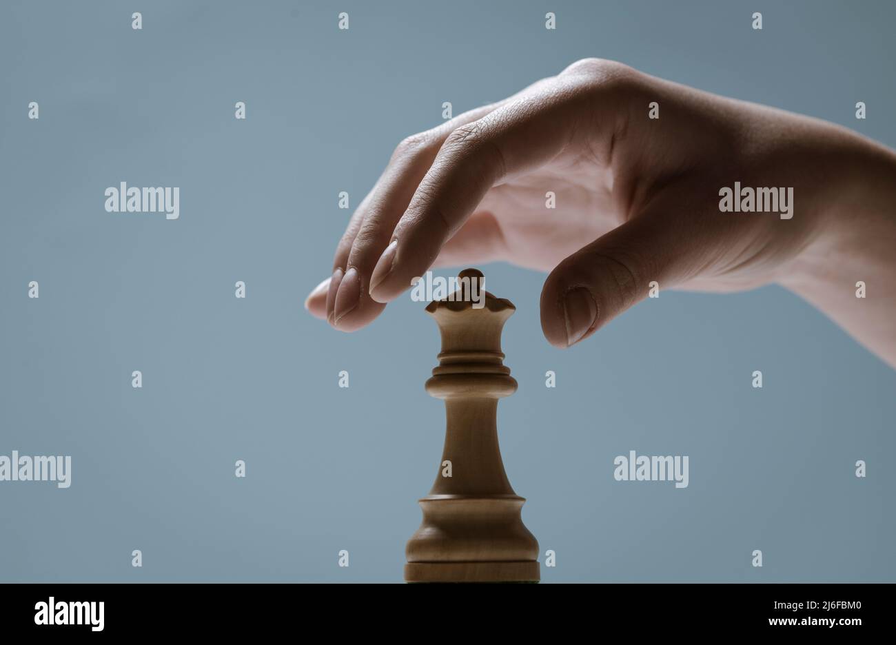 Professional chess player moving a piece, strategy and tactics games ...