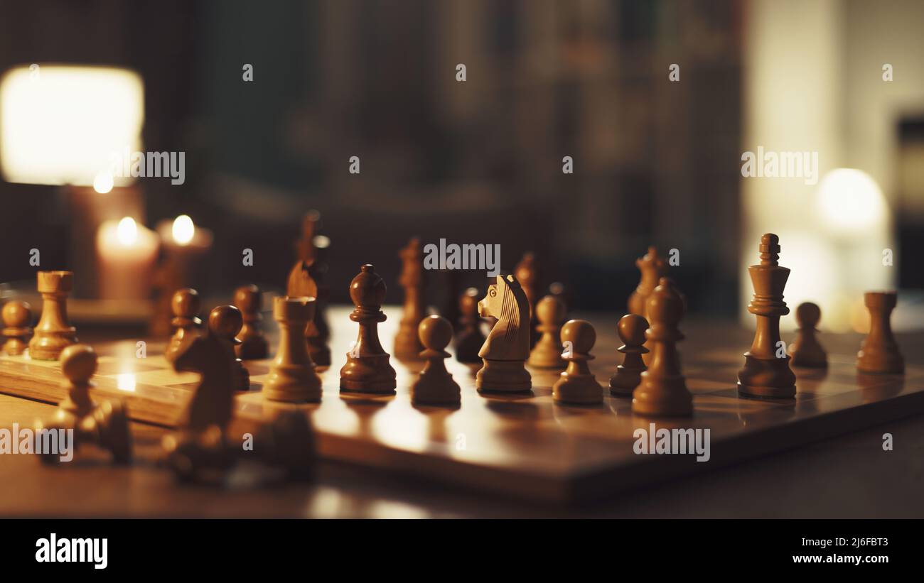 Chess game with luxury wooden chess set and living room interior Stock ...