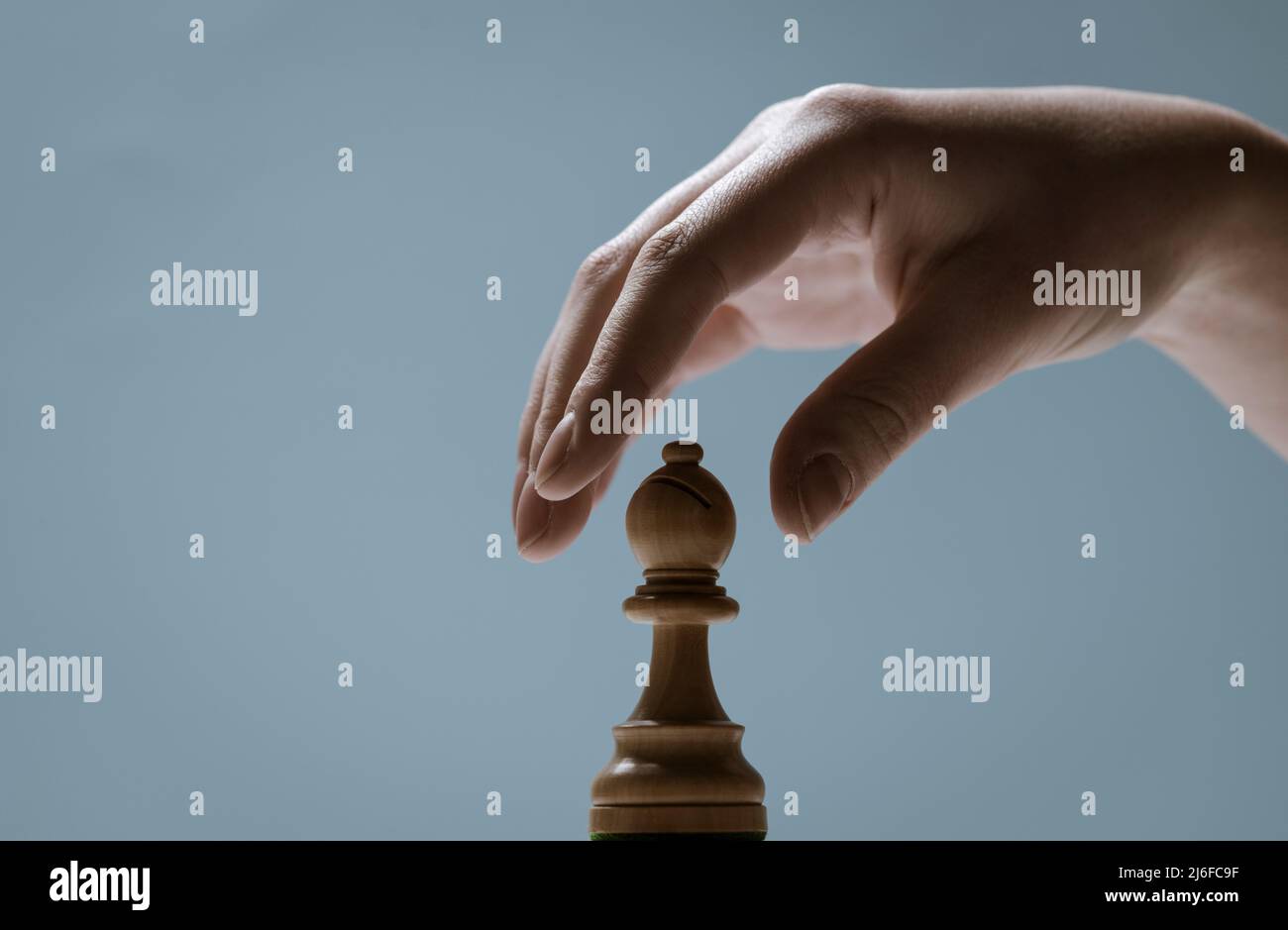 Professional chess player moving a piece, strategy and tactics games ...