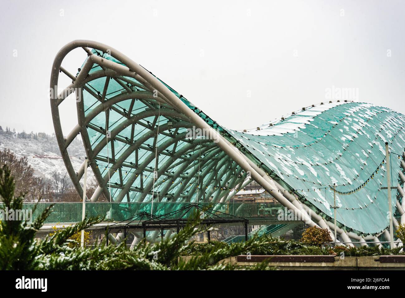 Tbilisi's downtown and glass bridge of Peace Stock Photo - Alamy